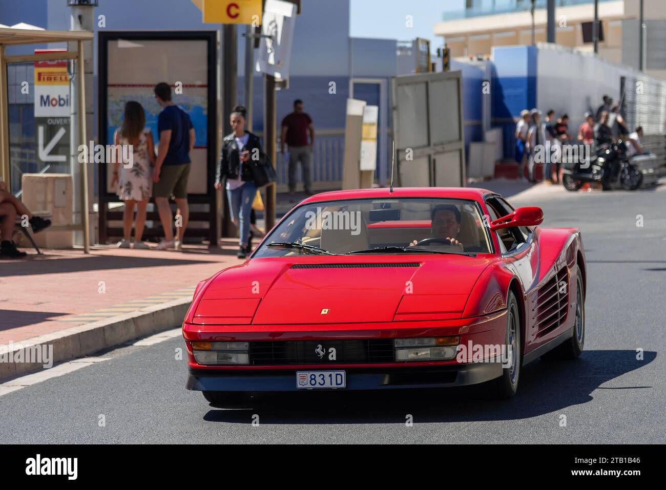Monaco, Monaco - Red Ferrari Testarossa driving on the road Stock Photo ...