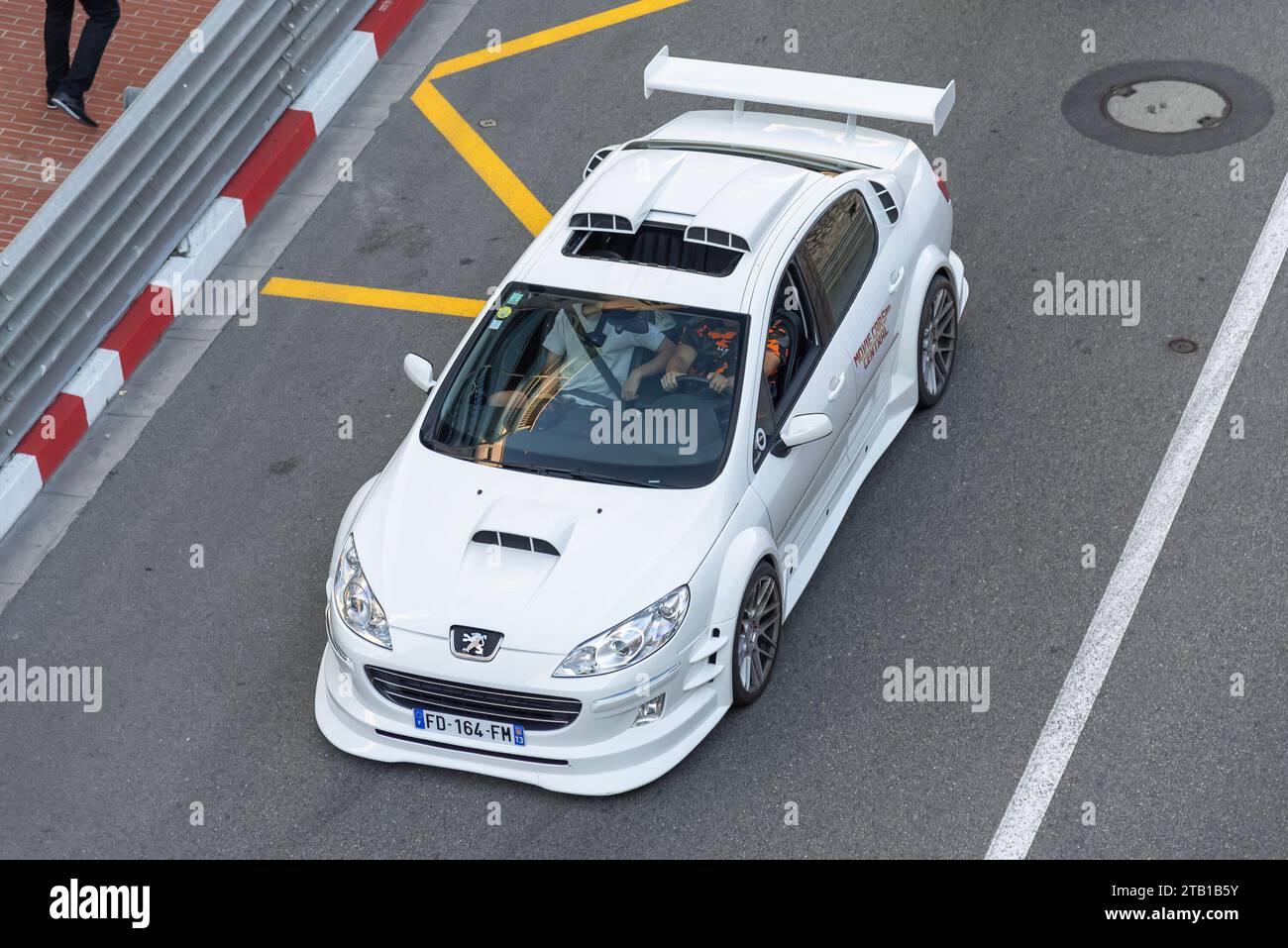 Monaco, Monaco - White Peugeot 407 driving on the road in the Fairmont ...