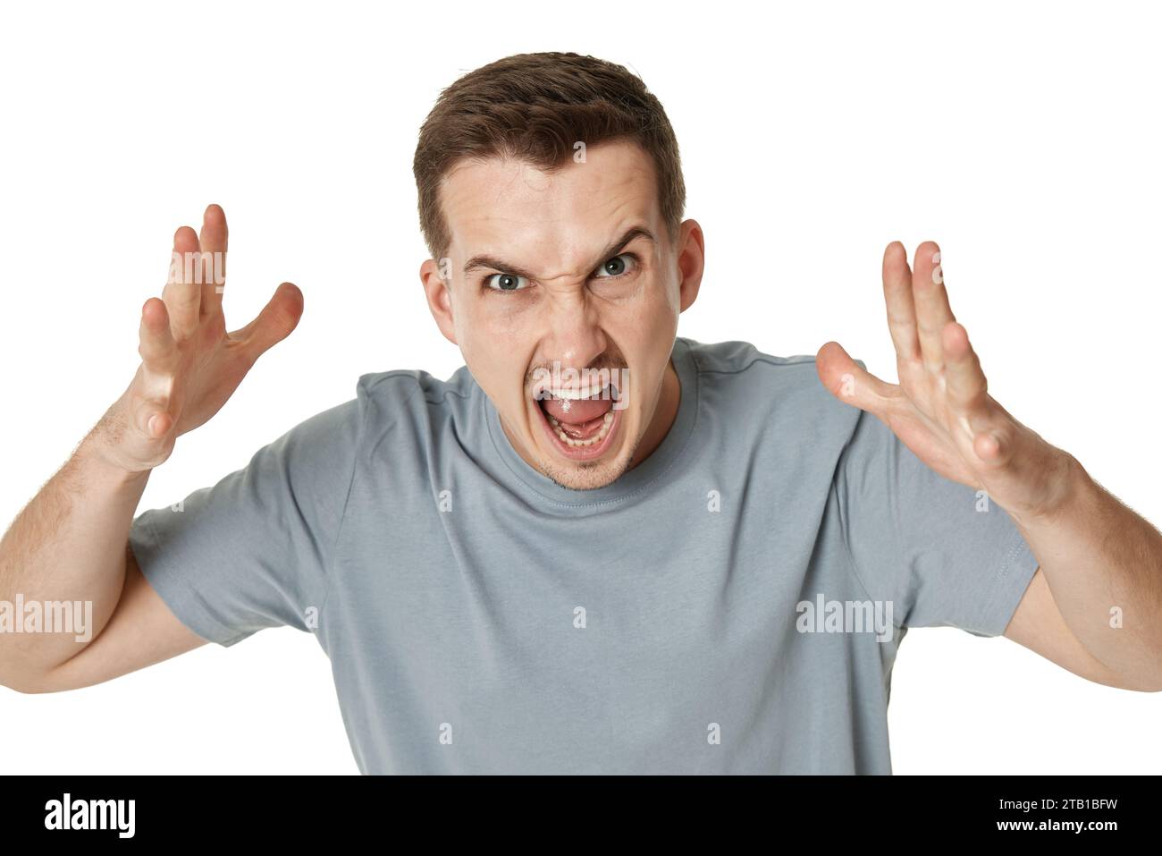 annoyed angry bearded man shouting on white studio background Stock ...