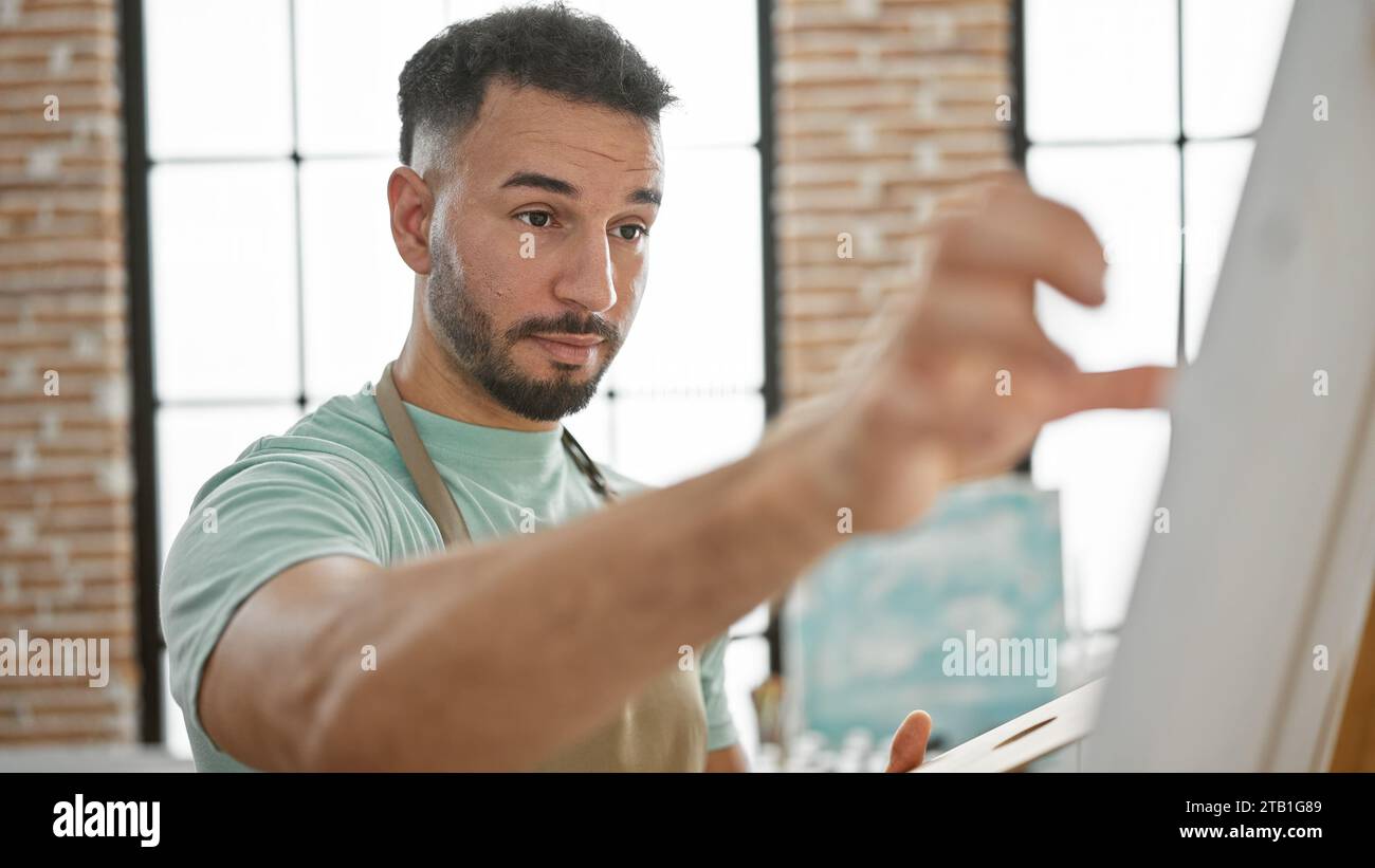 Young arab man artist hi-res stock photography and images - Alamy