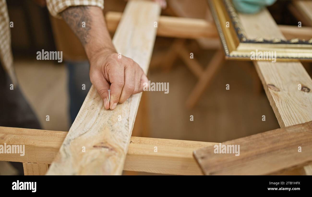 Two trusty carpenters partnering in carpentry, industriously driving a ...