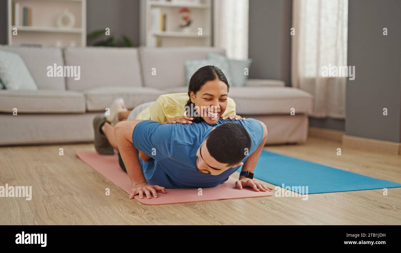 Beautiful couple in love, enjoying sporty lifestyle & training together ...
