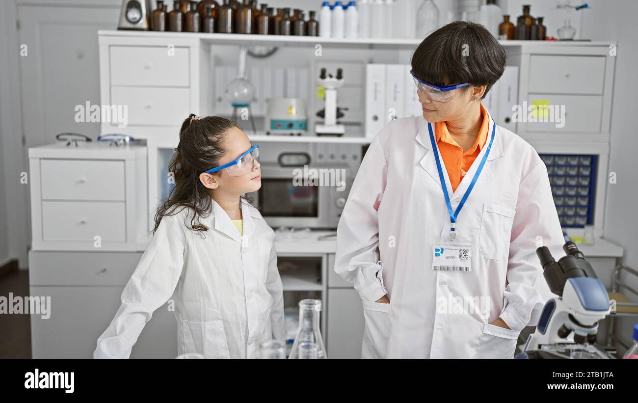 Two happy scientists in hi-res stock photography and images - Alamy