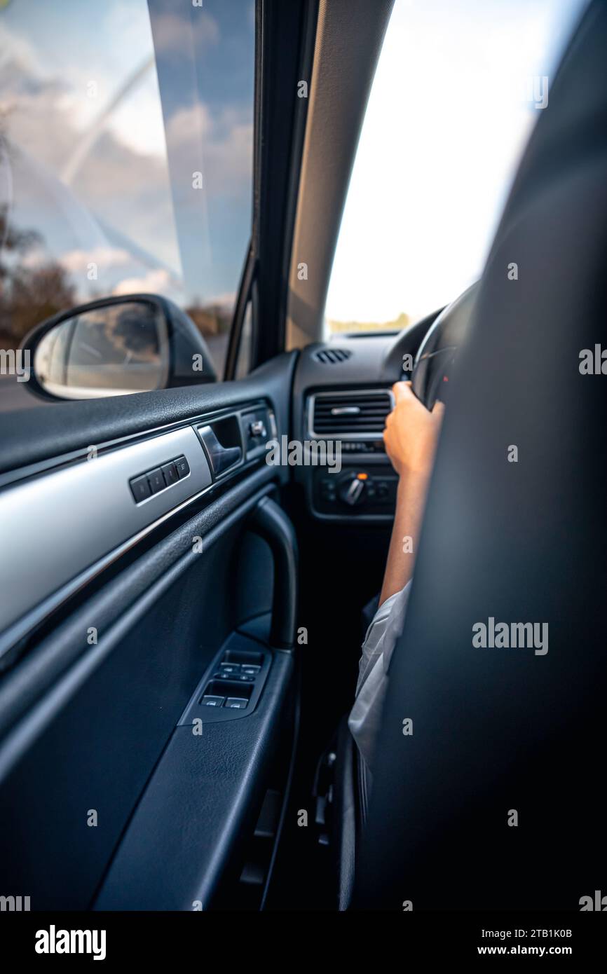 Car rear view mirror, view from inside the car Stock Photo - Alamy