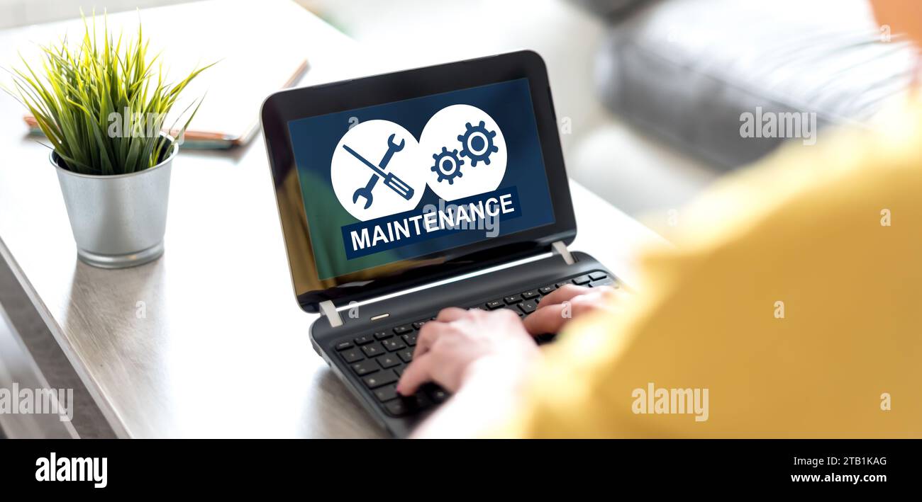 Laptop screen displaying a maintenance service concept Stock Photo - Alamy