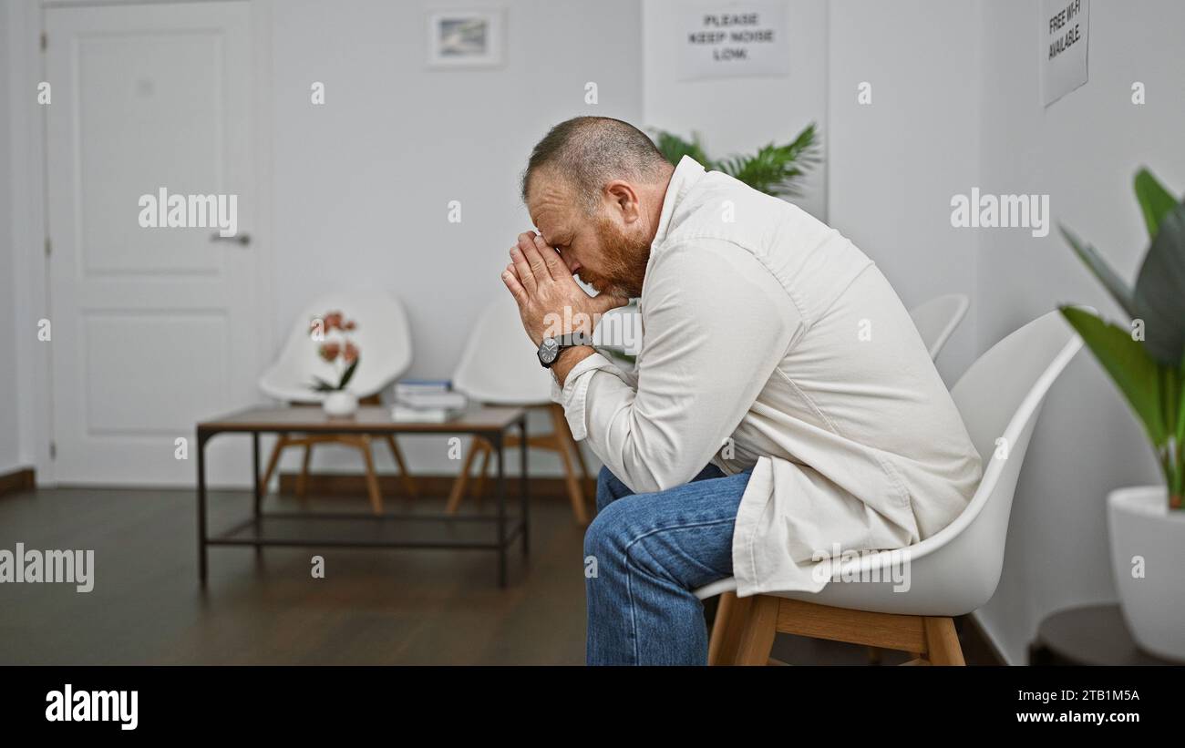 Frustrated man sitting on chair hi-res stock photography and images - Alamy