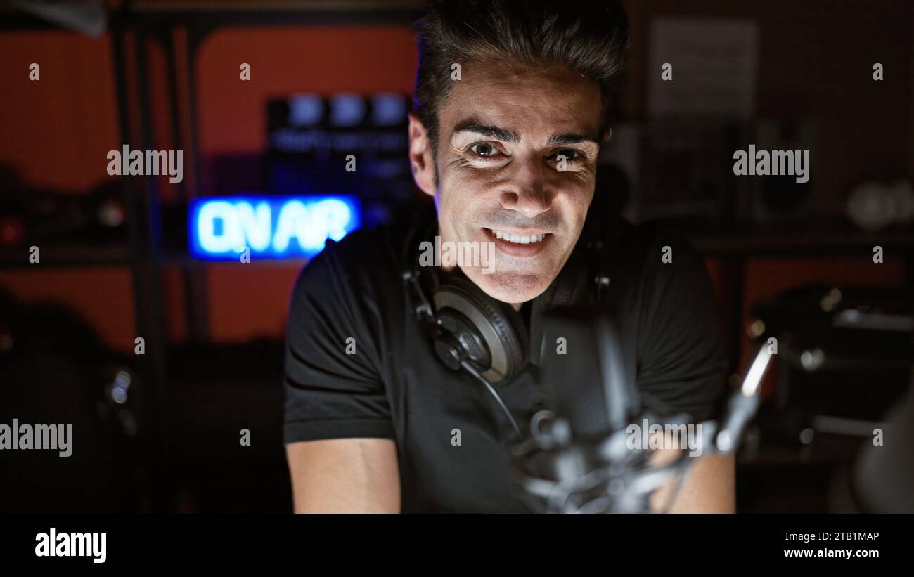 Young hispanic man radio reporter smiling confident at radio studio ...