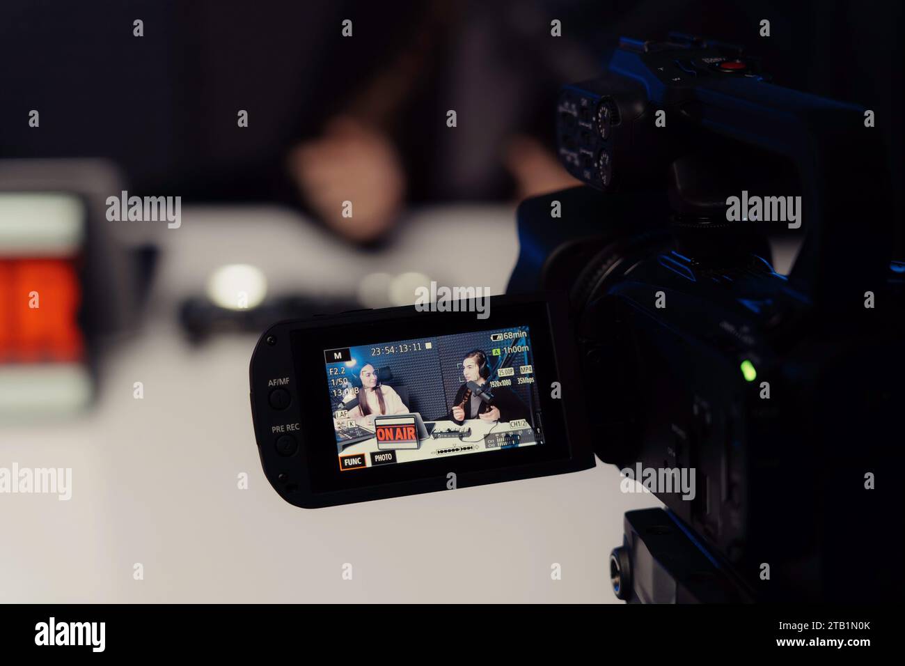 Behind the Scenes: Filming a Podcast Episode Stock Photo - Alamy