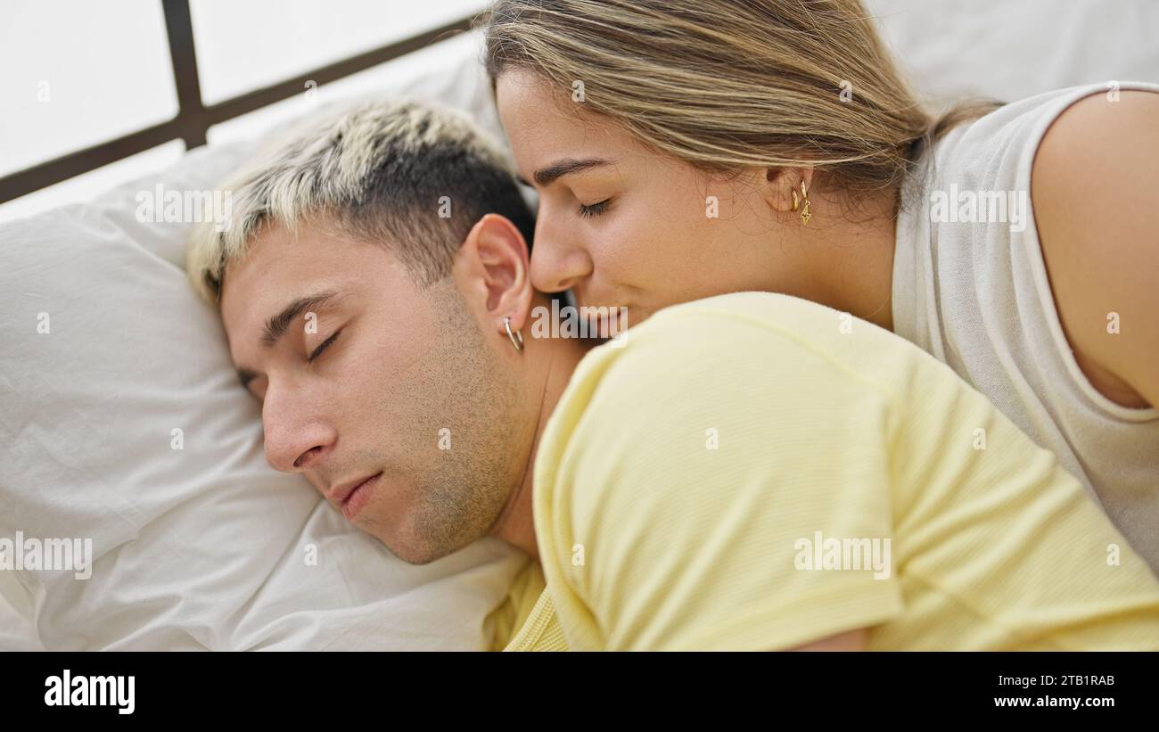 Woman asleep man kiss bed hi-res stock photography and images - Alamy