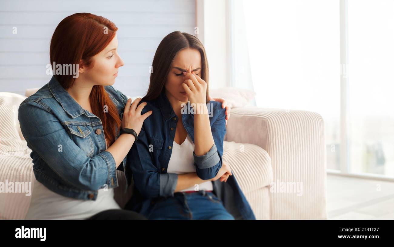 Sad girl crying friend comforting hi-res stock photography and images ...