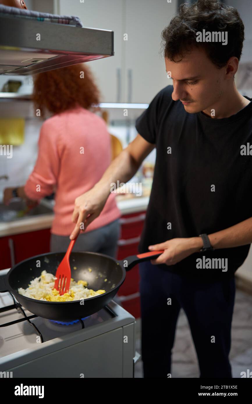 Asian man cooking fried rice hi-res stock photography and images - Alamy