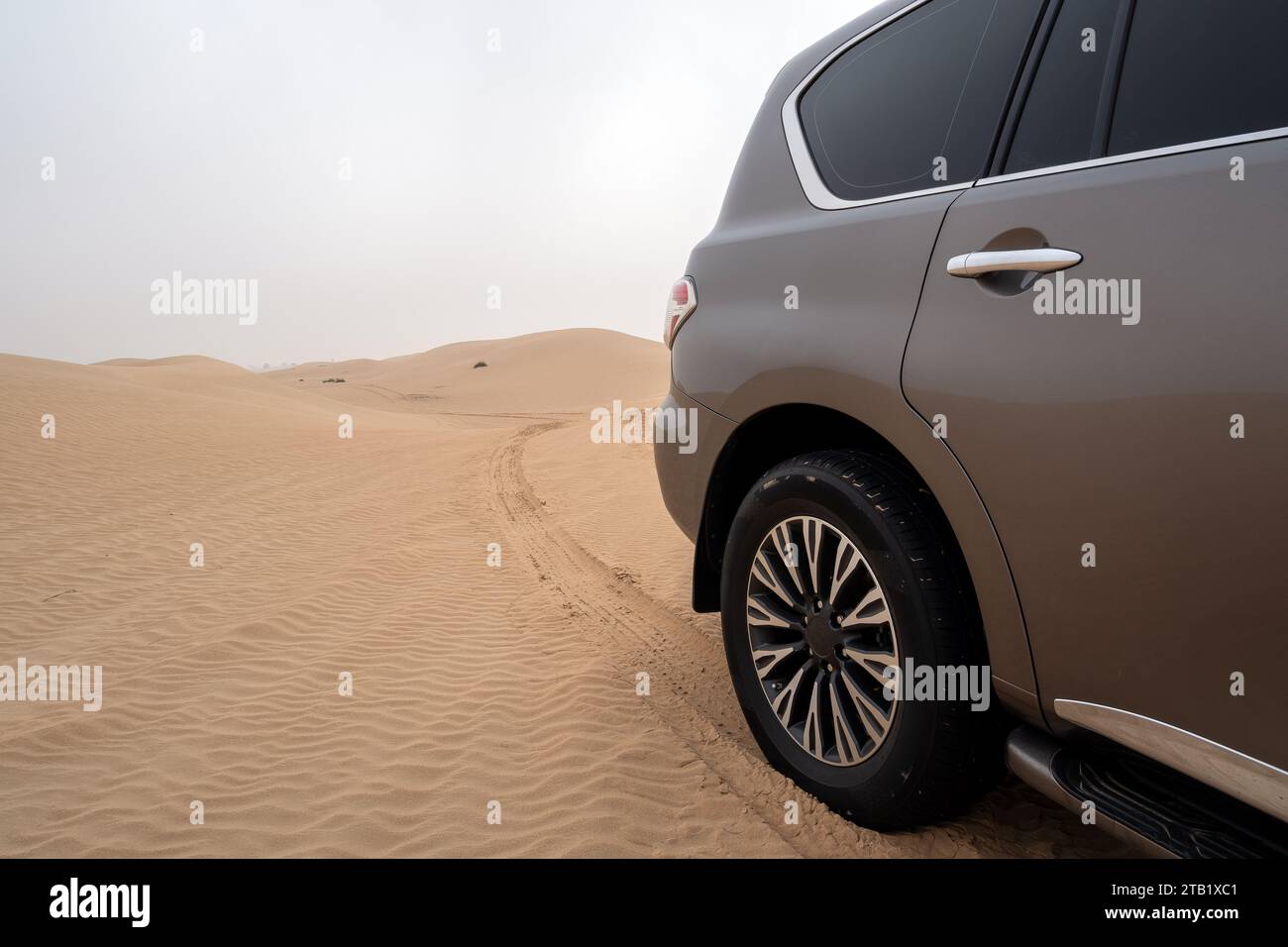 SUV four wheel drive vehicle car Al Qudra empty quarter seamless desert ...