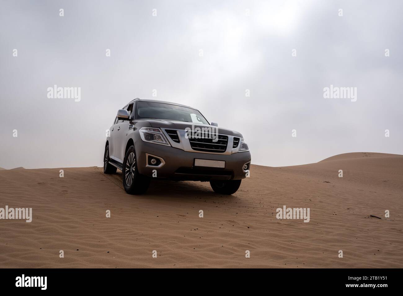 SUV four wheel drive vehicle car Al Qudra empty quarter seamless desert ...