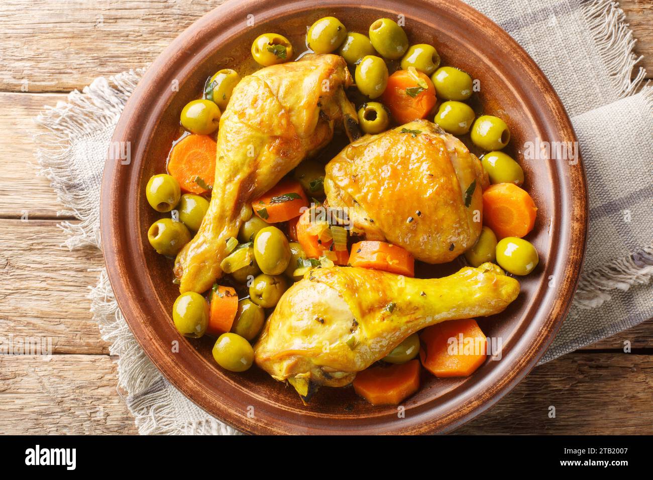 Algerian Chicken with olives and carrot Tajine Zitoune close-up on ...