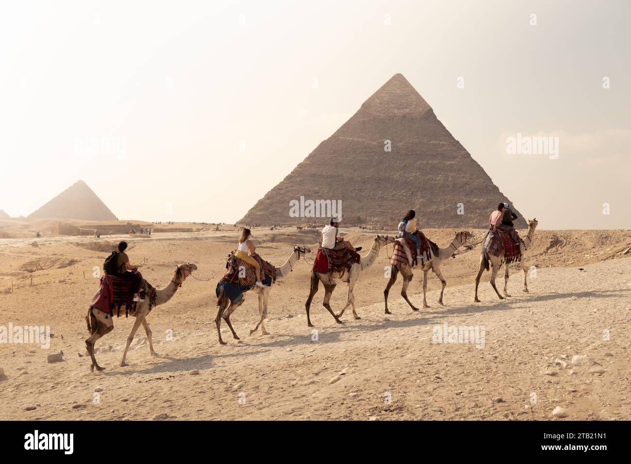 Tourists riding camels in egypt hi-res stock photography and images - Alamy