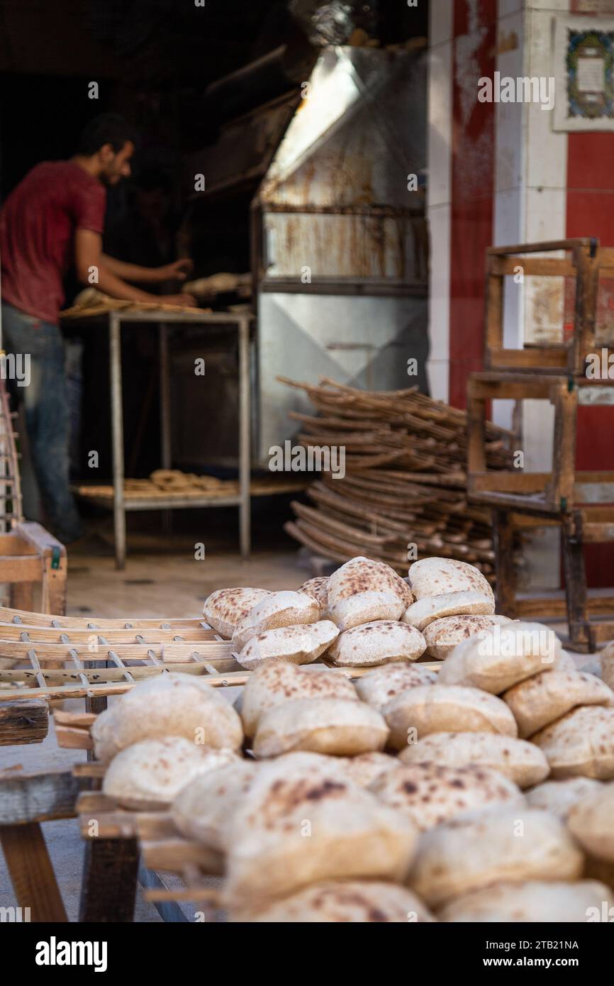 Fresh recently baked bread outside egyptian bakery Stock Photo - Alamy