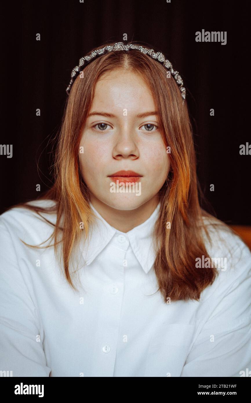 Serious emotional portrait of a teenage girl with red hair Stock Photo ...