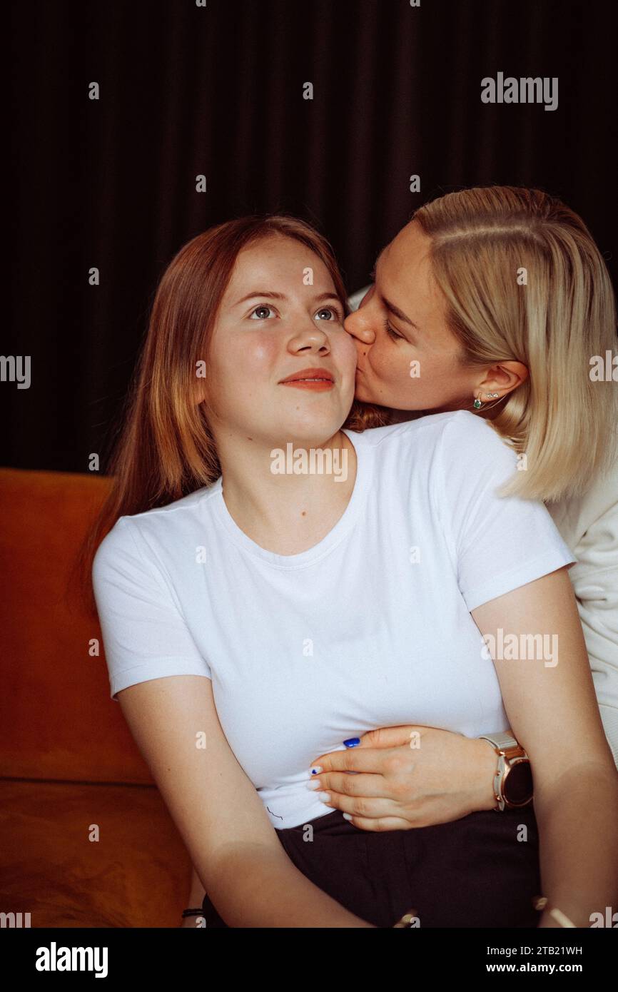 Mom and teenage daughter, emotional portrait, love and laughter Stock ...