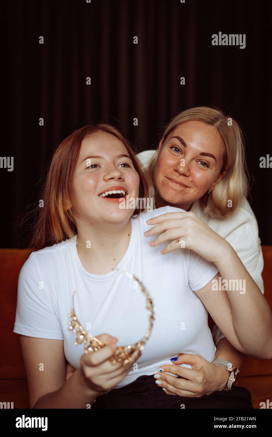 Mom and teenage daughter, emotional portrait, love and laughter Stock ...