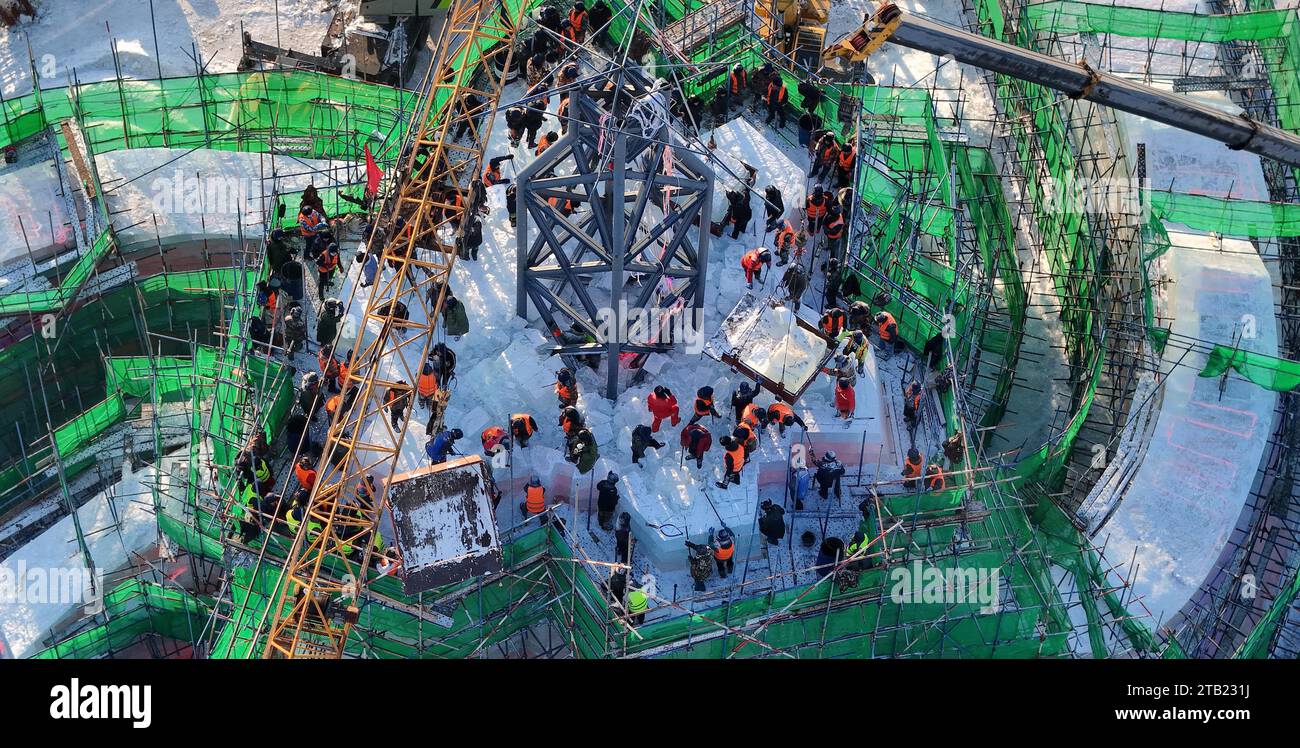 Aerial photo shows workers constructing the Harbin Ice and Snow World ...