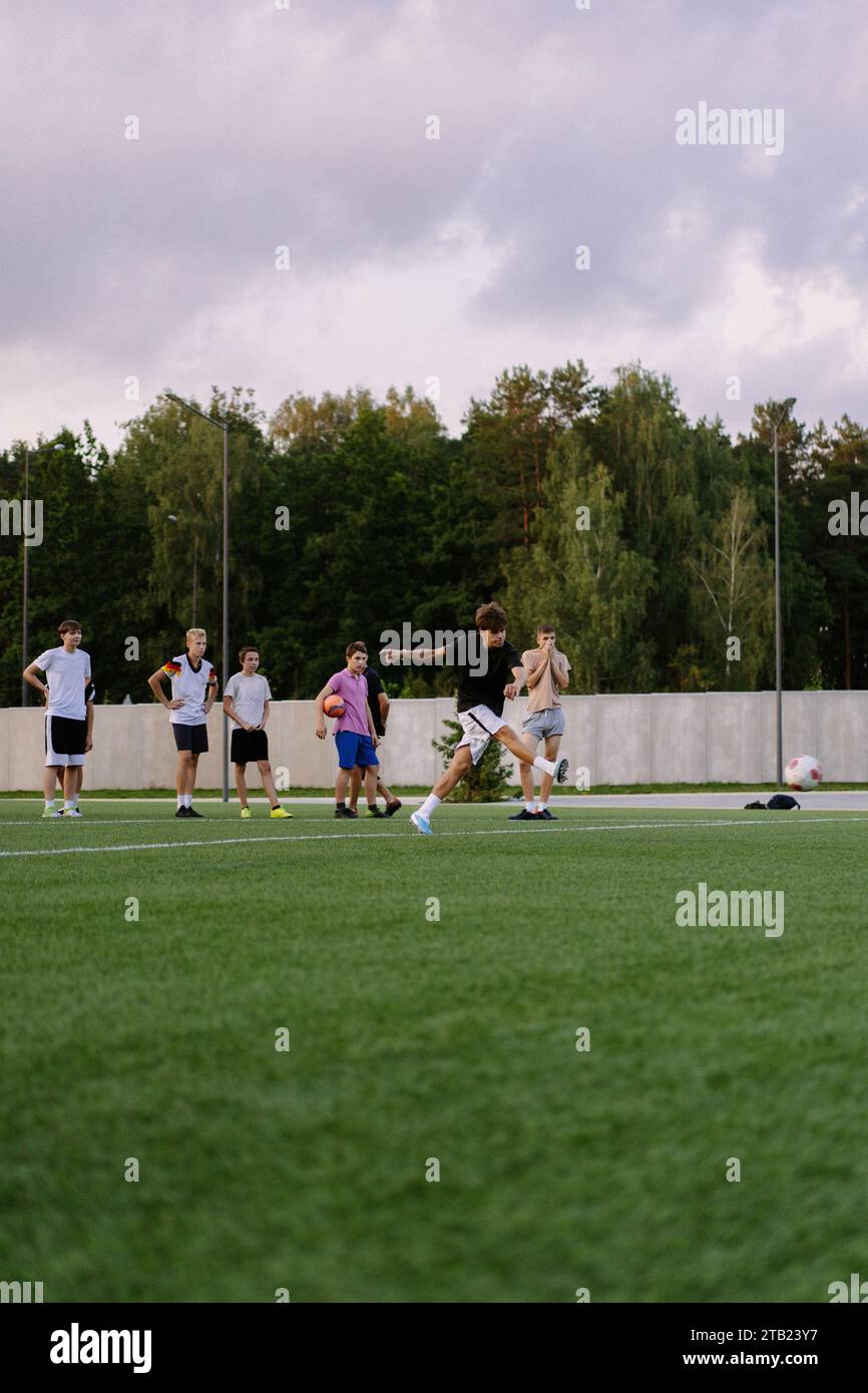 Children playing football berlin germany hi-res stock photography and ...