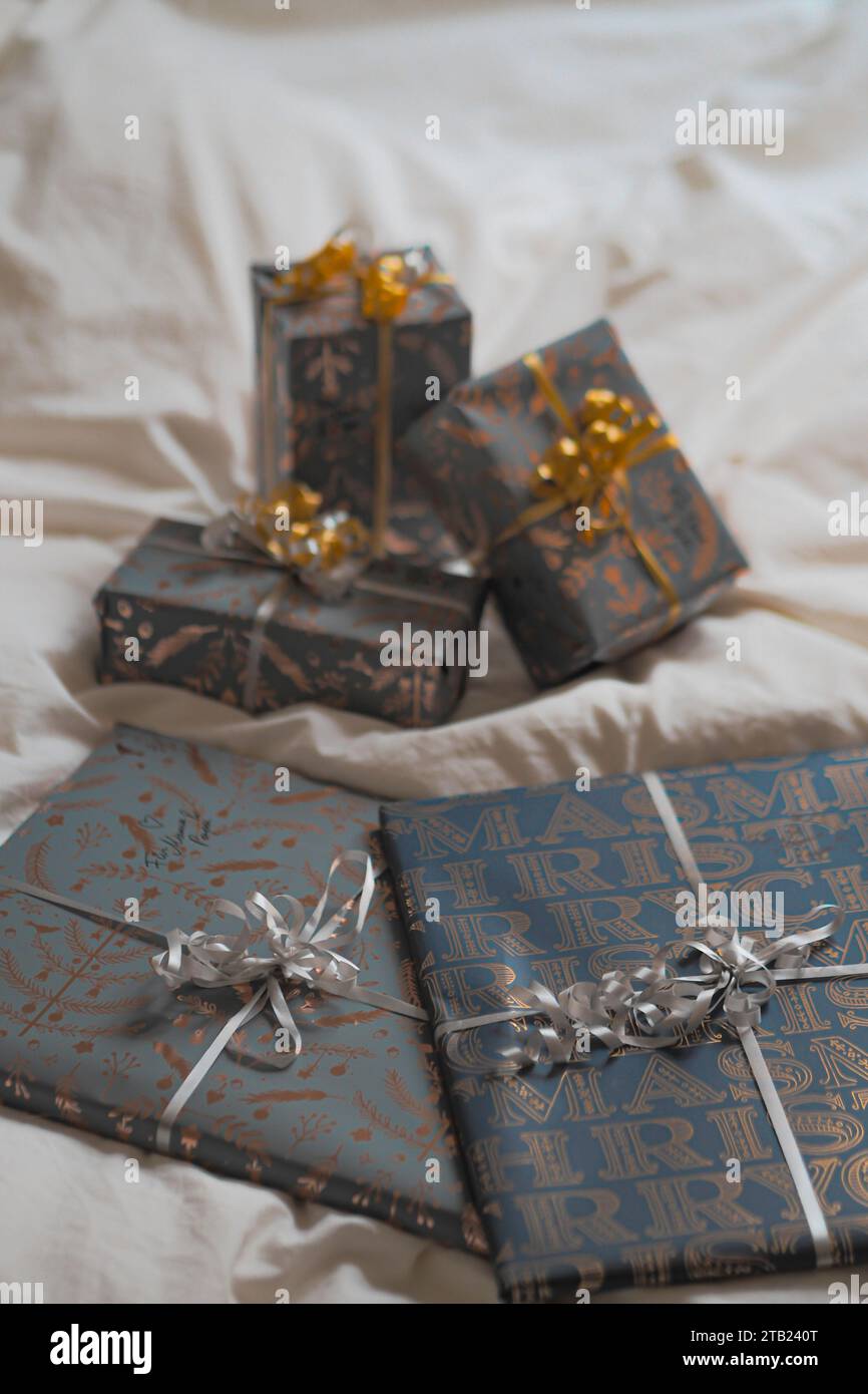 An aesthetically pleasing arrangement of gifts in a variety of sizes ...