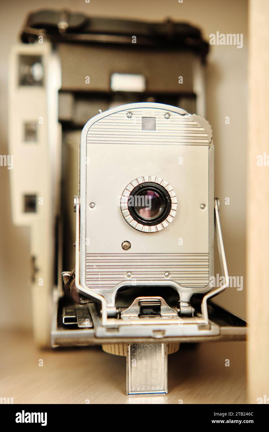 A medium format camera released in the late 1950s. The front of the ...