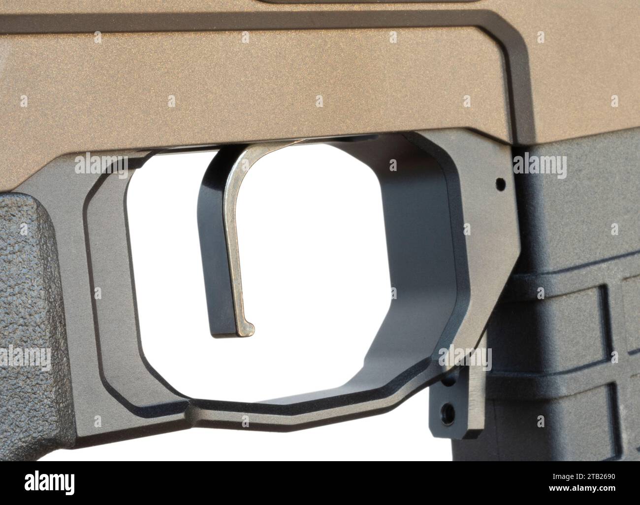Trigger on a brown high powered rifle seen from behind at a quartering ...