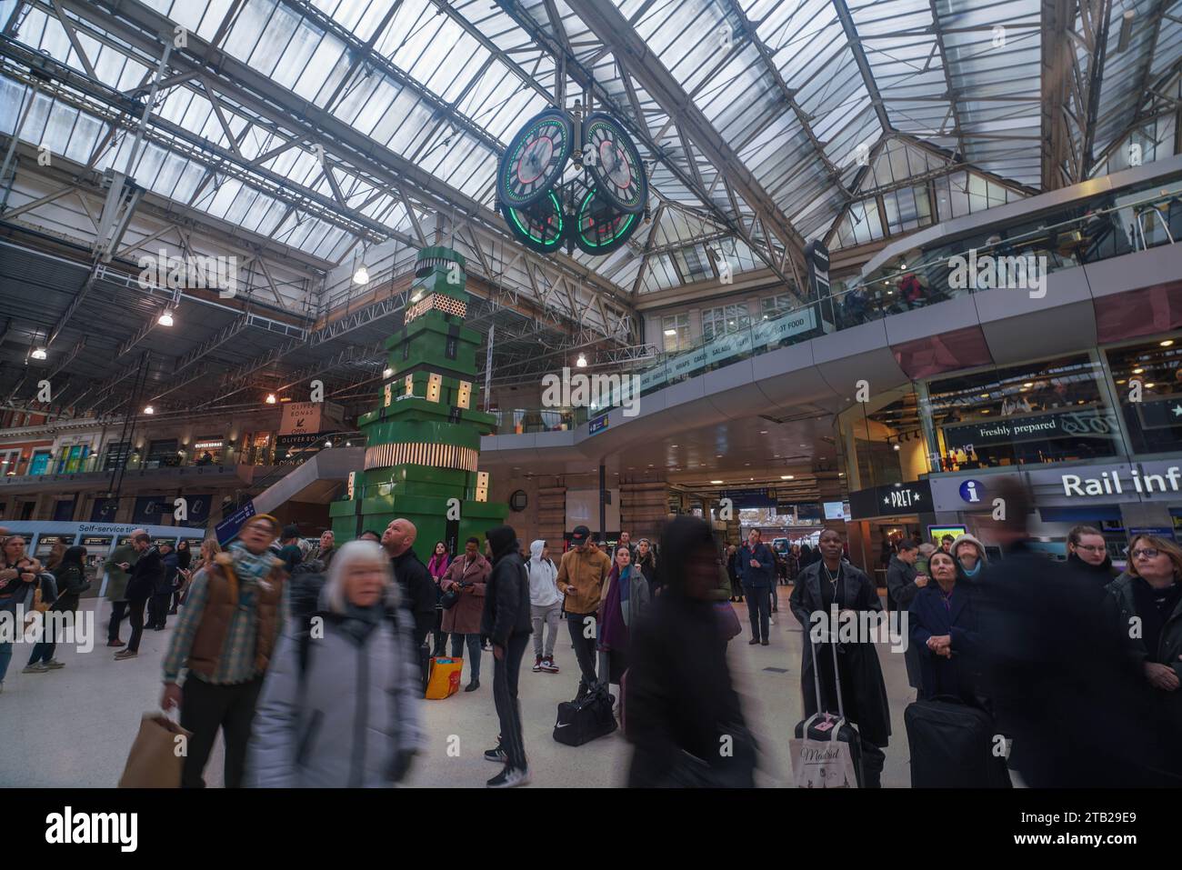 London UK. 4 December 2023. A 10-meter christmas tree shaped in green ...