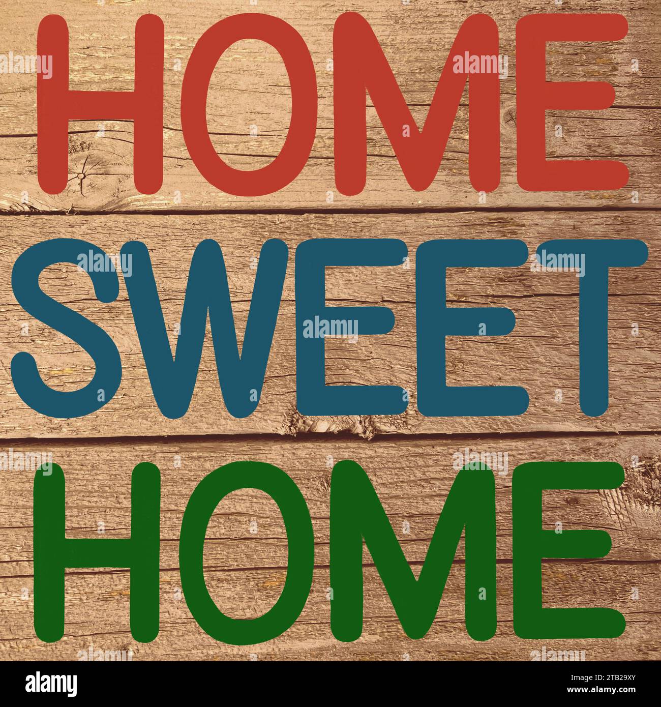 Home sweet home sign on a plank wood background. Bold hand drawn ...