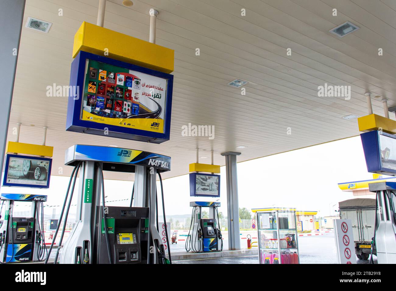 Naftal fuel dispensers at a gas station in Algeria featuring an ...