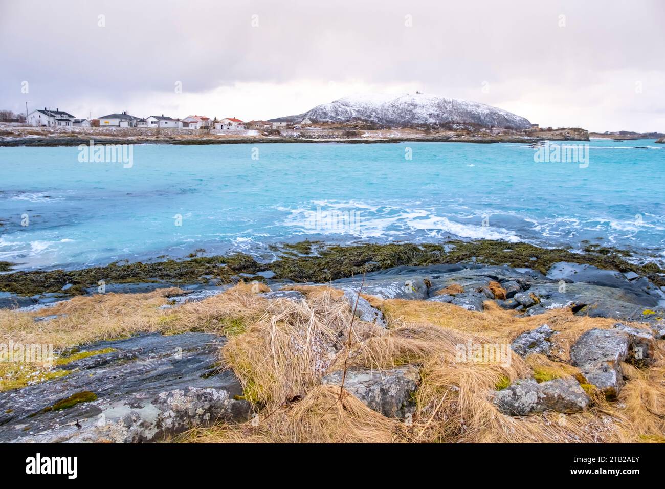 Sommaroy islands and arctic sea near Tromso Norway. Sunset over snowy ...