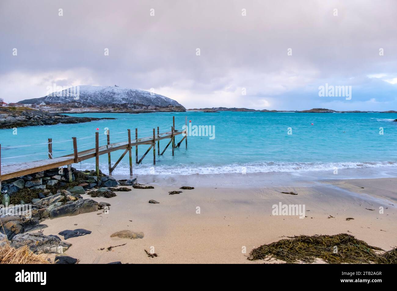 Sommaroy islands and arctic sea near Tromso Norway. Sunset over snowy ...
