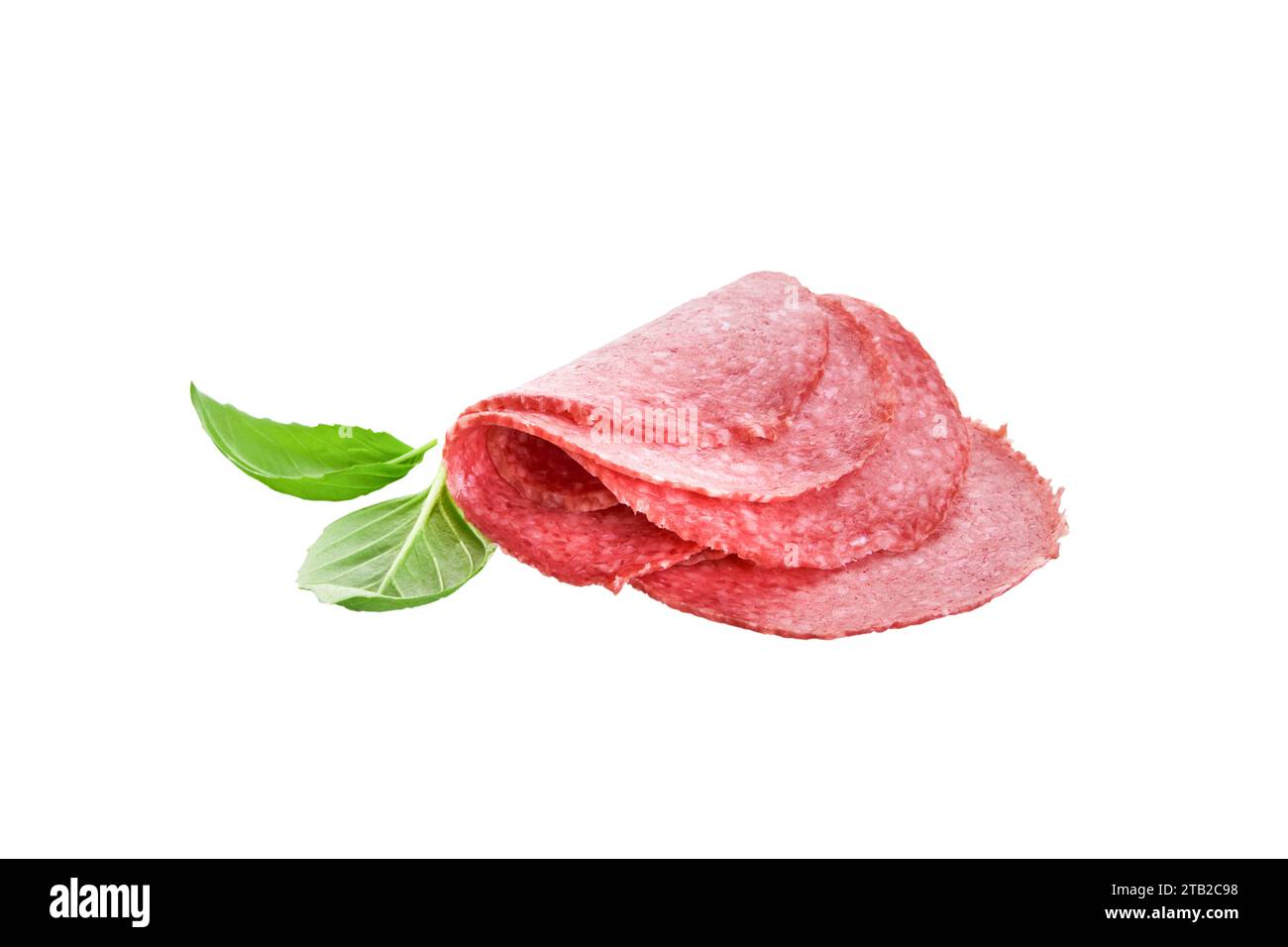 Salami sausage slices and leaf green basil isolated on white background. Few pieces or several ...