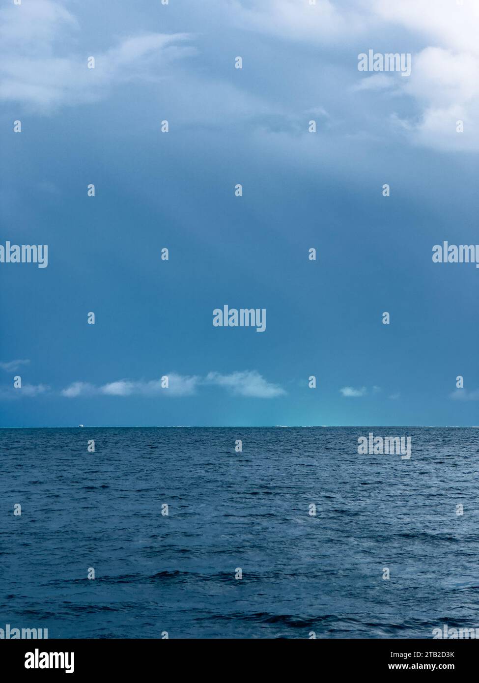 rain storm over tropical island and ocean Stock Photo - Alamy