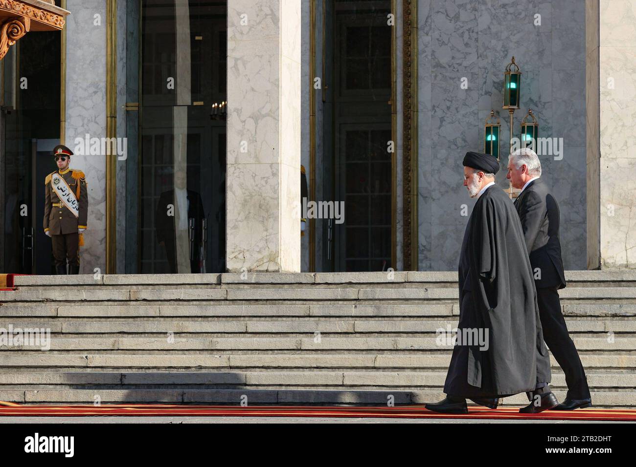 Tehran, Iran. 4th Dec, 2023. Iranian President EBRAHIM RAISI (2R ...