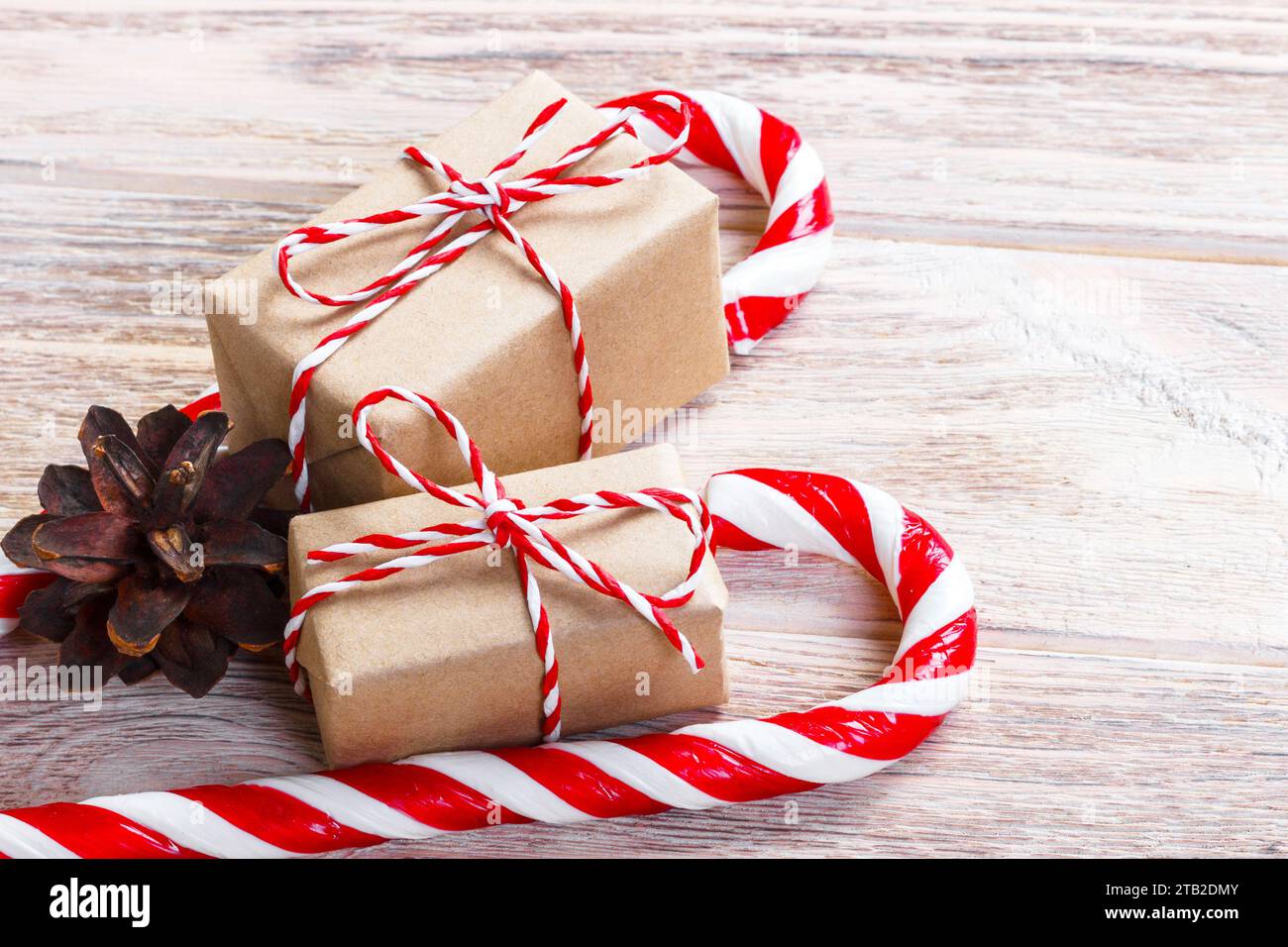 New Year's gift in a homemade box with a red bow near the and Christmas ...