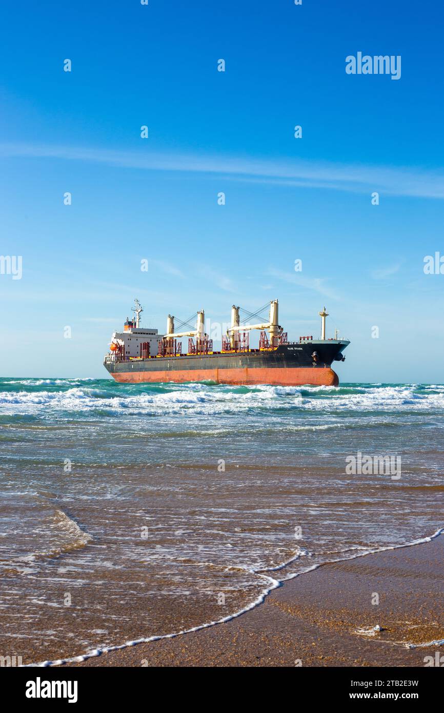 A large cargo ship Blue Shark stands aground in the sea, Vityazevo ...