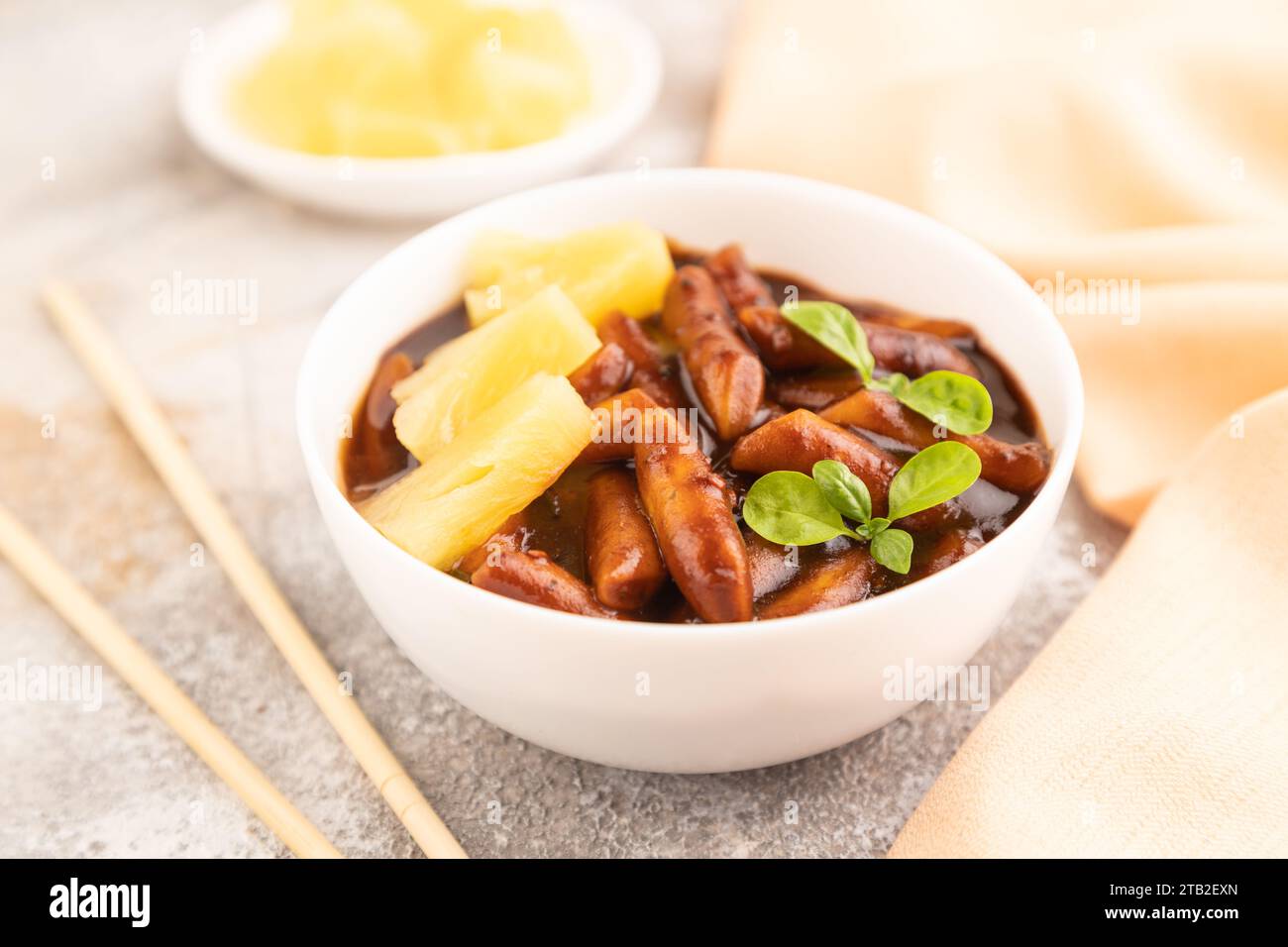 Tteokbokki or Topokki, fried rice cake stick, popular Korean street ...