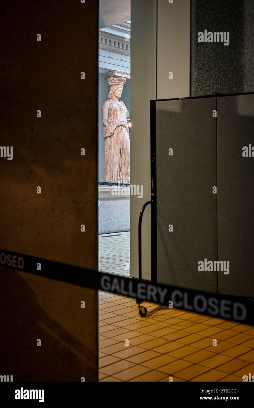 A statue in a gallery with a closed sign in the foreground in London ...