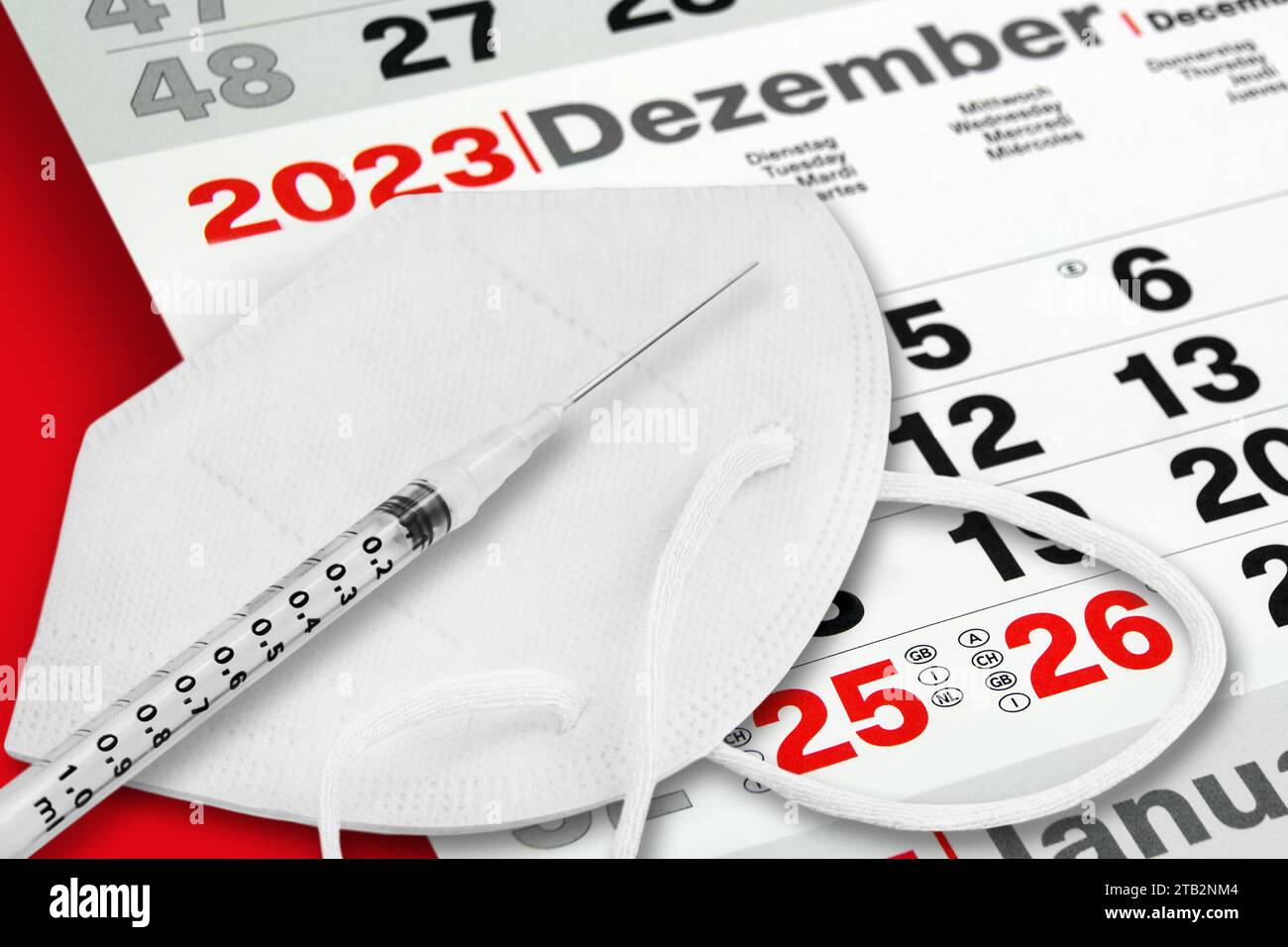German calendar December 2023 and January 2024 with face mask and ...