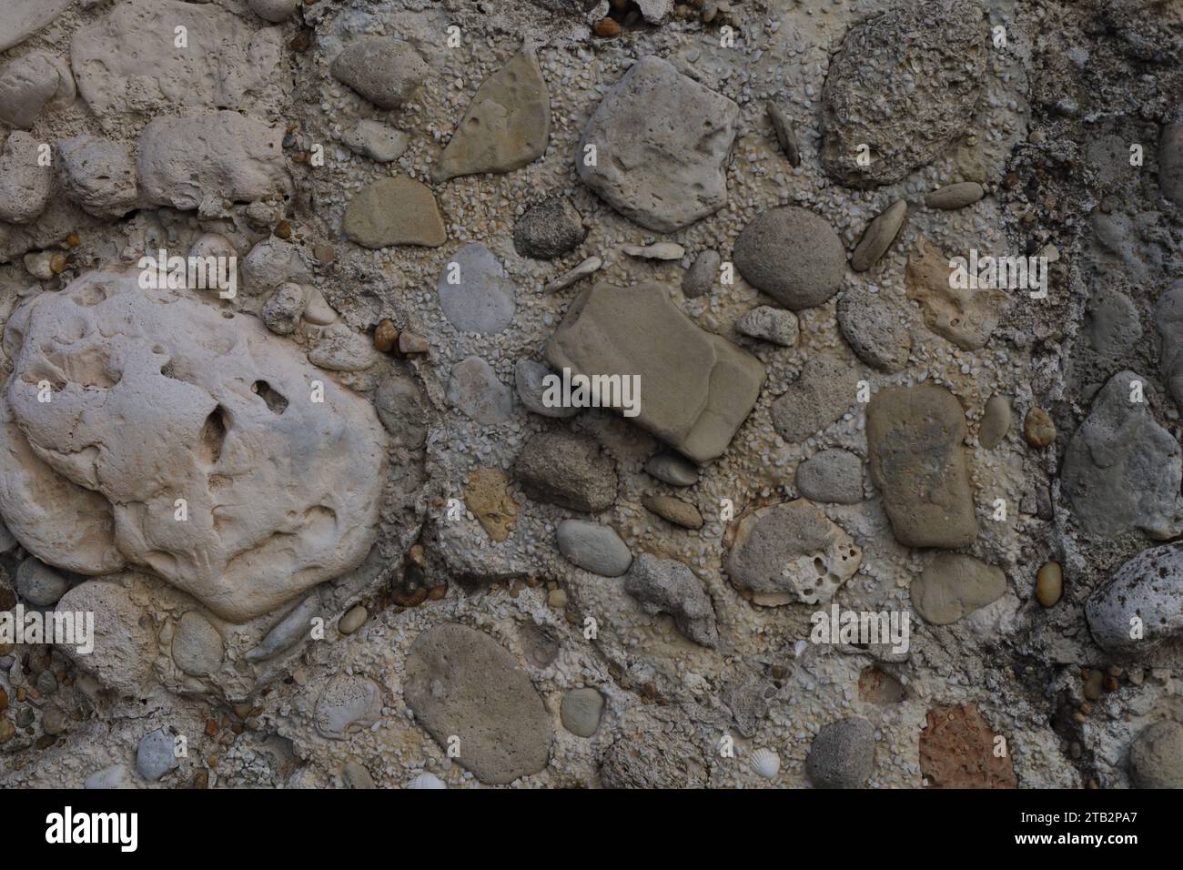 Rocky texture on a wall Stock Photo - Alamy