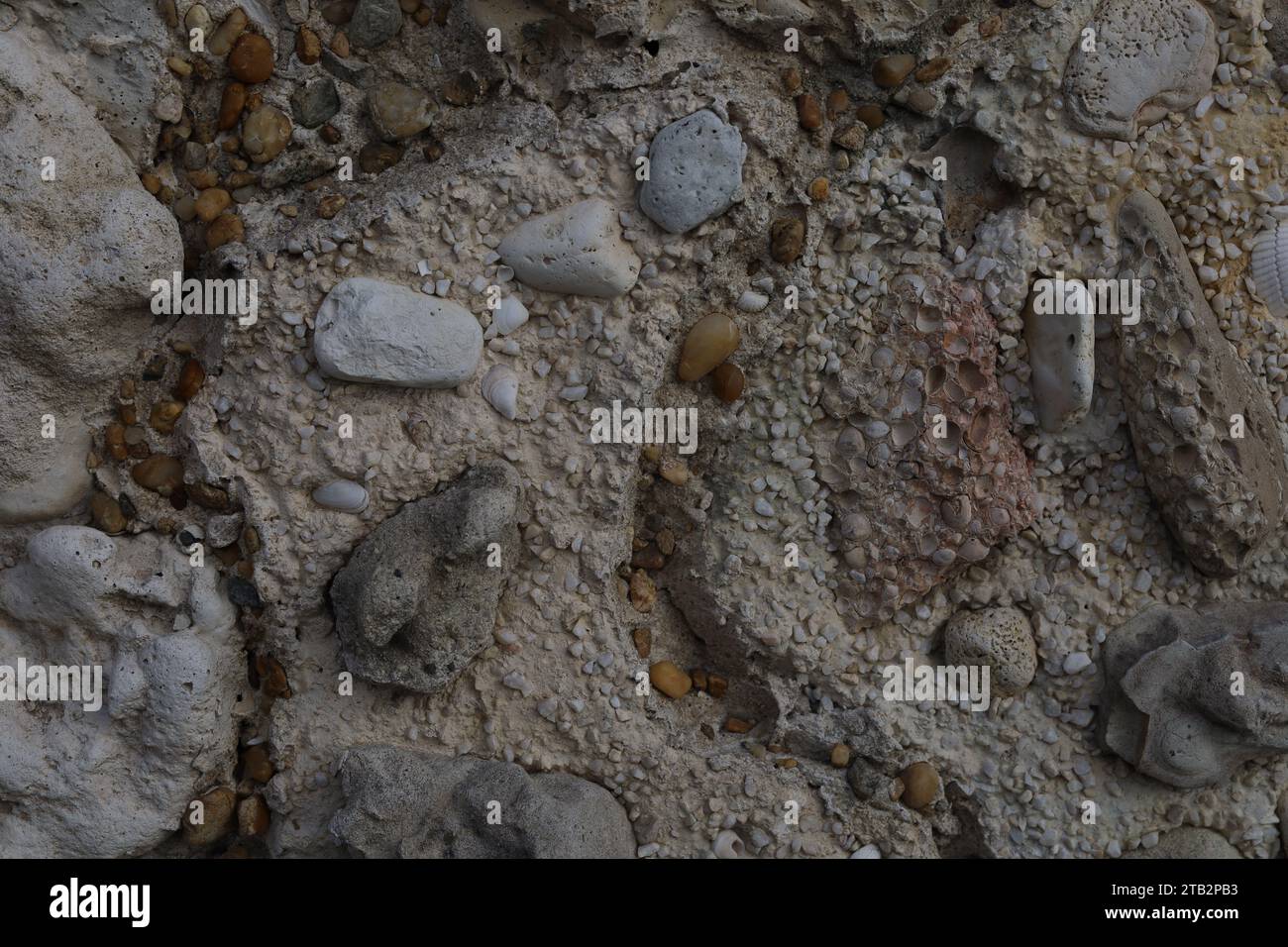 Rocky texture on a wall Stock Photo - Alamy