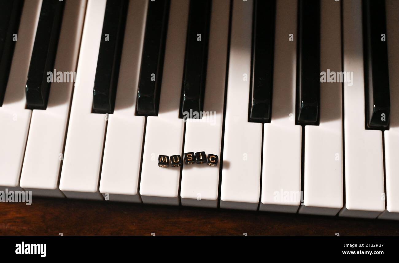 Word music concept written hi-res stock photography and images - Alamy