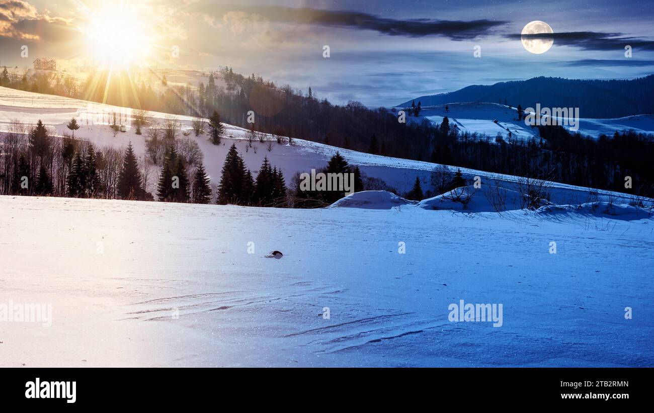 mountainous landscape in winter. snow covered meadow beneath a sky with ...