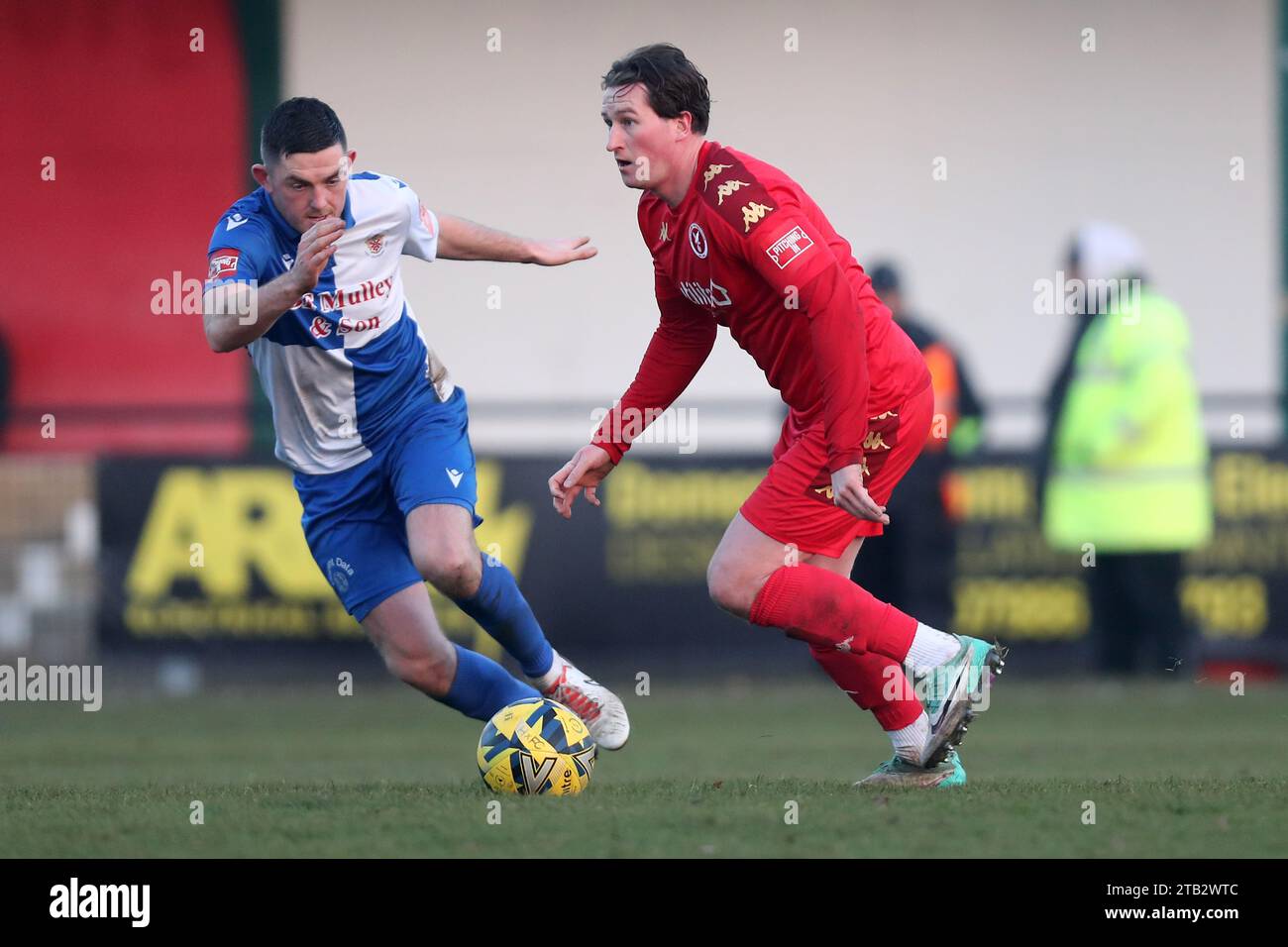 Charlie Harris of Whitehawk and Tom Wraight of Hornchurch during ...