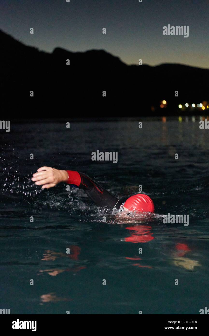 A determined professional triathlete undergoes rigorous night time ...