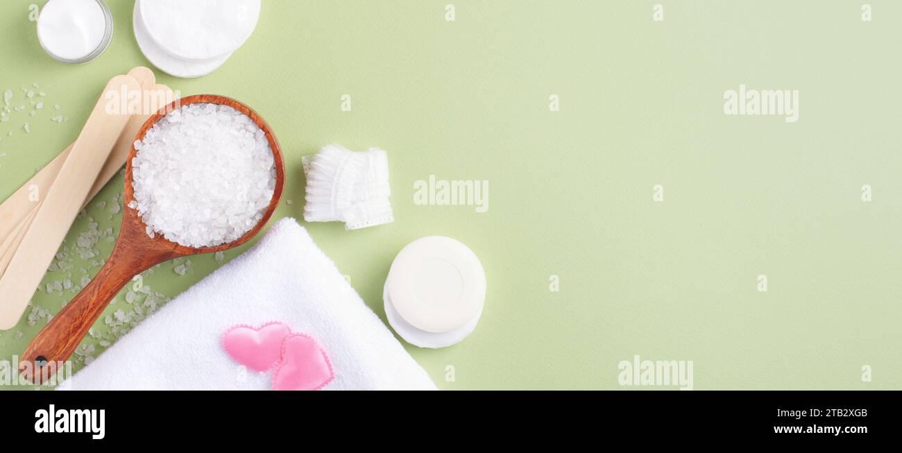 Bath and shower products and accessories on olive color background ...