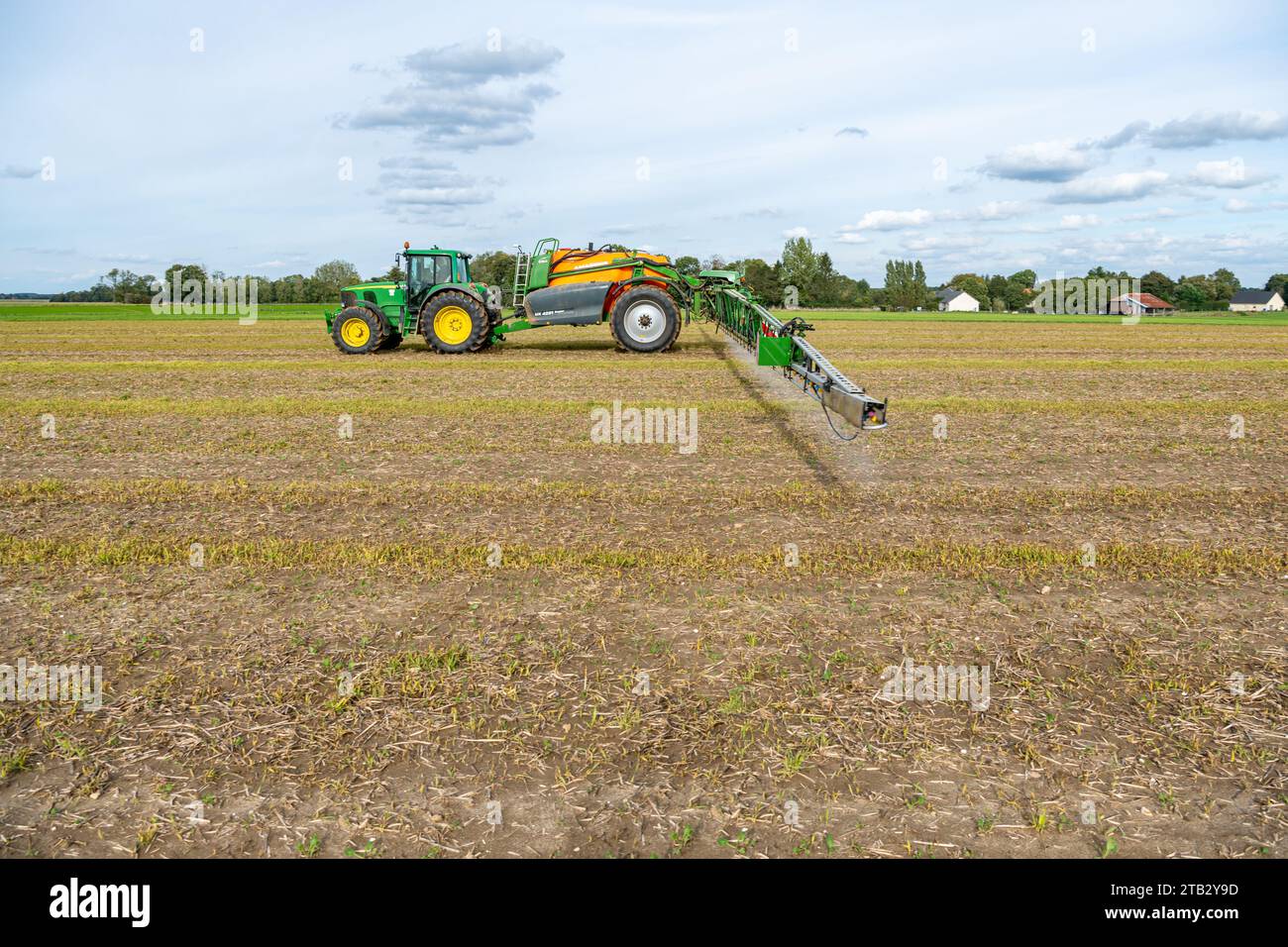 Spreading trace elements on a newly sown rapeseed field. John Deere ...