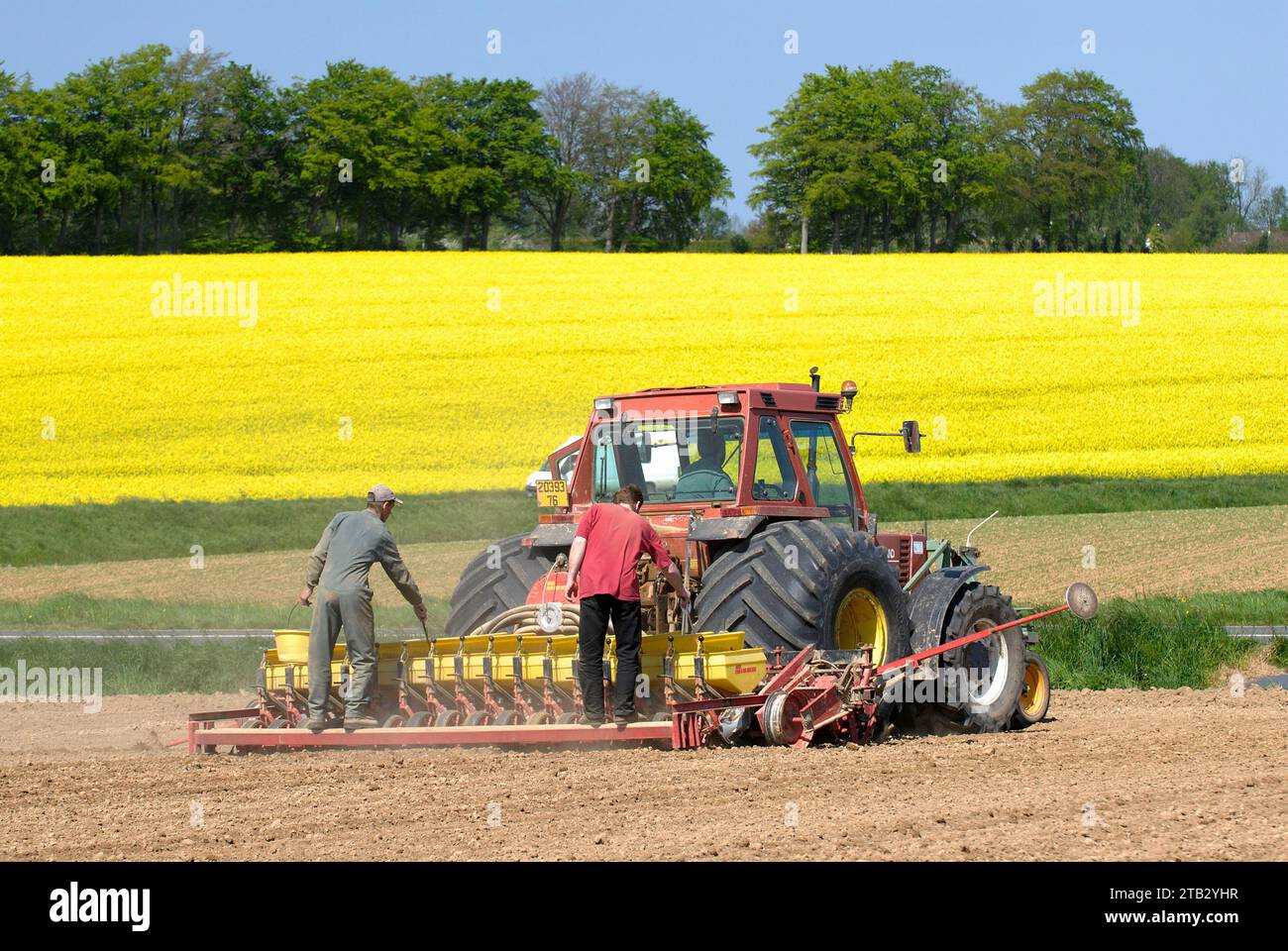 Tractor sowing seeds seed drill hi-res stock photography and images - Alamy